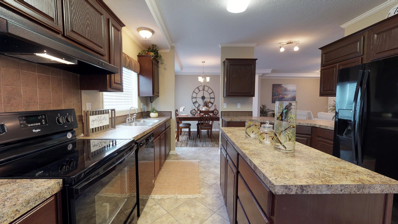 spacious kitchen in a Solitaire manufactured home